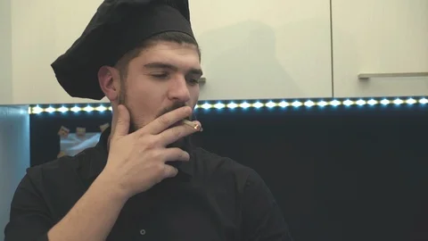 Chef Smoking Cigarettes Stock Footage ~ Royalty Free Stock Videos | Pond5