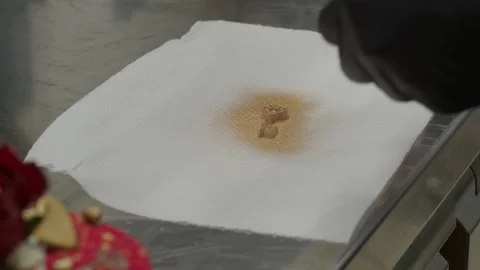 chef spray gold paint on key shaped choc... | Stock Video | Pond5