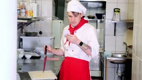 Chef taking order slip in commercial kit... | Stock Video | Pond5