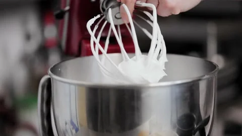 Chefs check meringue mouse texture on el... | Stock Video | Pond5