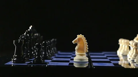 Chess boards and chess pieces game on bl... | Stock Video | Pond5