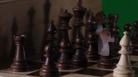 Chess on a green background. Chess board... | Stock Video | Pond5