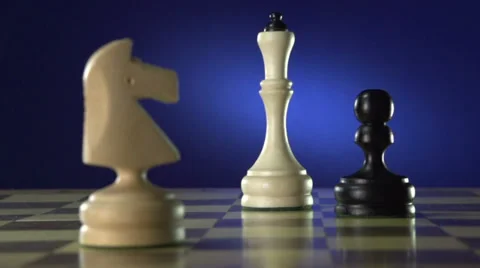 Chess pieces on blue background | Stock Video | Pond5