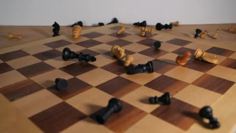 Chess pieces falling onto a chessboard i... | Stock Video | Pond5