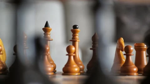 chess pieces on a wooden board. Board st... | Stock Video | Pond5