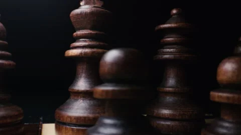Chess pieces on wooden chessboard before... | Stock Video | Pond5