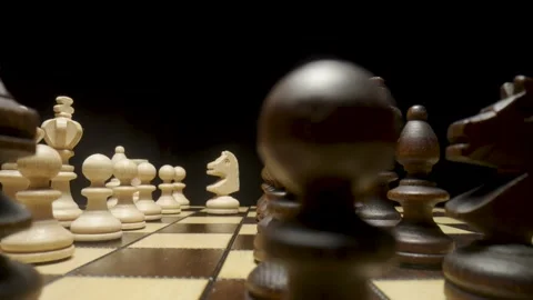 Chessboard with chess pieces placed on i... | Stock Video | Pond5