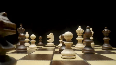 Chessboard with chess pieces placed on i... | Stock Video | Pond5