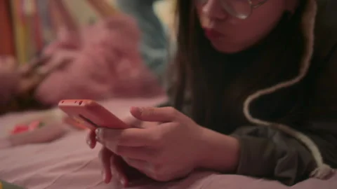 Chewing Korean Teen Using Phone Relaxing... | Stock Video | Pond5