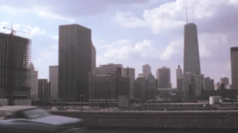 Chicago - 1973: vehicles drive in street... | Stock Video | Pond5