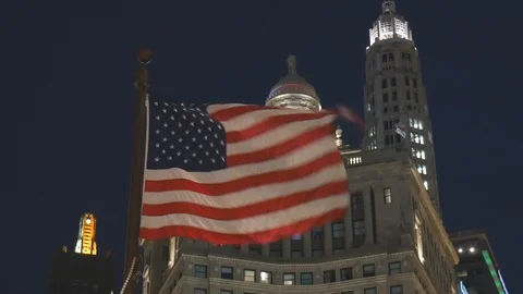 Chicago scene, American flag waving in w... | Stock Video | Pond5