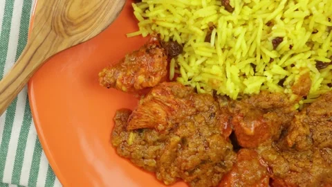 Chicken Biryani and Raisin Rice | Stock Video | Pond5