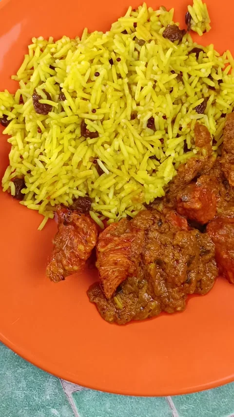 chicken biryani and raisin rice | Stock Video | Pond5