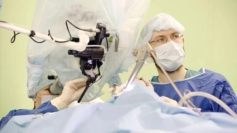 chief surgeon is performing an incision ... | Stock Video | Pond5