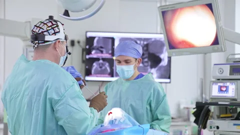 Chief surgeon uses metal tools moving th... | Stock Video | Pond5