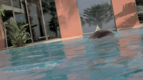Child bathing in outdoor swimming pool. ... | Stock Video | Pond5