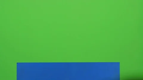 Child boy appeared from behind a blue po... | Stock Video | Pond5