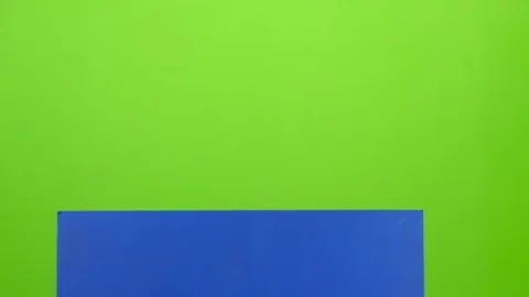 Child boy appeared from behind a blue po... | Stock Video | Pond5