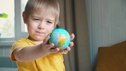 Child Holding Earth Stock Videos – Royalty-Free HD & 4K Videos | Pond5
