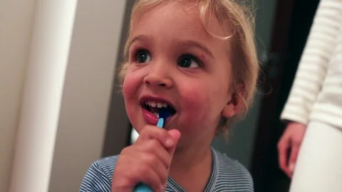 Child brushing teeth in 4K. Young boy br... | Stock Video | Pond5