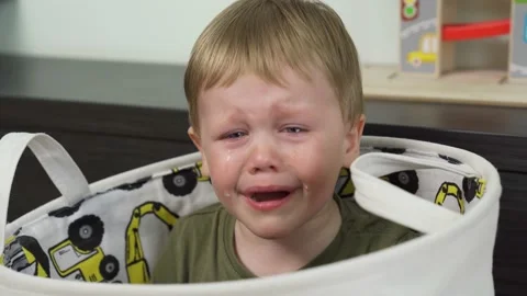 The child is crying a lot. Tears flow. S... | Stock Video | Pond5