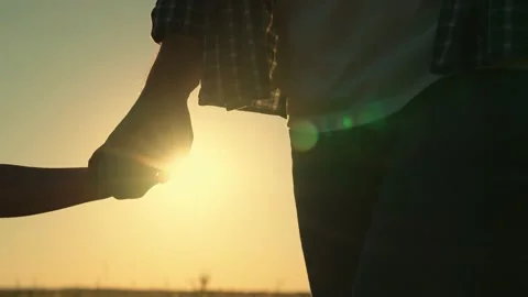 Child, dad hand in hand. Happy family. L... | Stock Video | Pond5