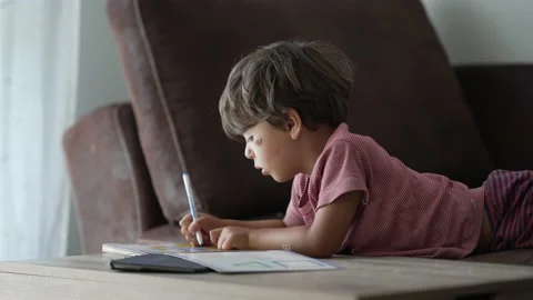 Child doing drawing activity at home. Ca... | Stock Video | Pond5