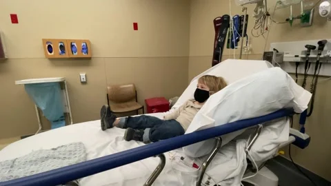 Child in Emergency Room Hospital Bed | Stock Video | Pond5