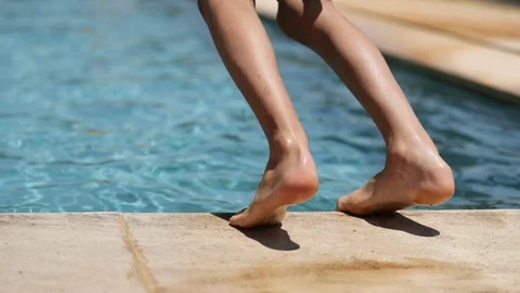 Child falling into swimming pool in 120f... | Stock Video | Pond5