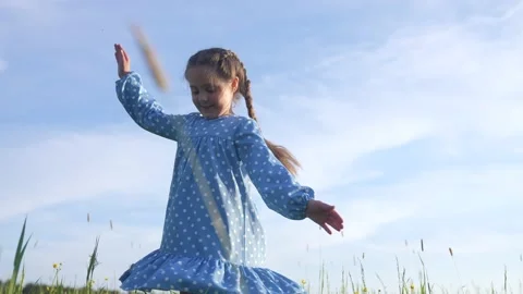 child girl a dancing in the field park. ... | Stock Video | Pond5