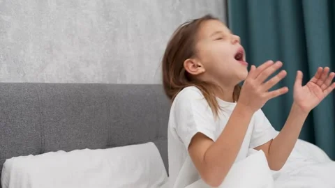 Child girl is sneezes snot into napkin o... | Stock Video | Pond5
