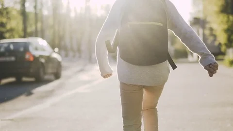 Girl Walking Stock Video Footage | Royalty Free Girl Walking Videos | Pond5