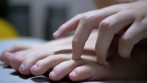 Child Hands Massage Skin the Toe, and Li... | Stock Video | Pond5