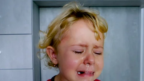 The child has snot. Selective focus. | Stock Video | Pond5