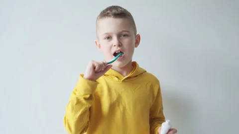 Child kid brushing his teeth, video 4k | Stock Video | Pond5