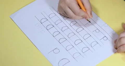 Child learns to write letters. Handwriti... | Stock Video | Pond5