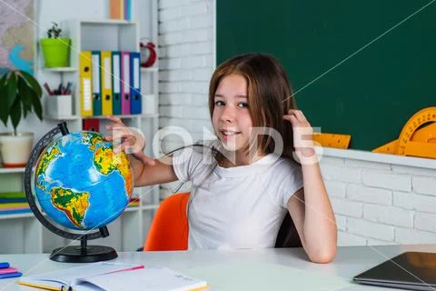 Child look at globe. geography. back to school. formal education in ...