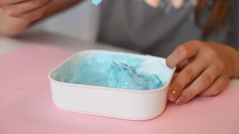 child making slime - step by step guide.... | Stock Video | Pond5