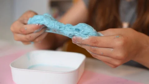 child making slime - step by step guide.... | Stock Video | Pond5
