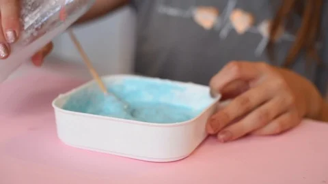 child making slime - step by step guide.... | Stock Video | Pond5
