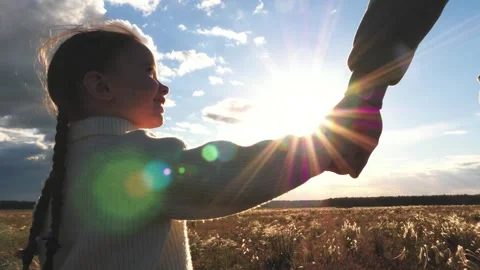 child mother father hand sunset sky, han... | Stock Video | Pond5