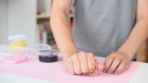 child play with slime. playing with slim... | Stock Video | Pond5