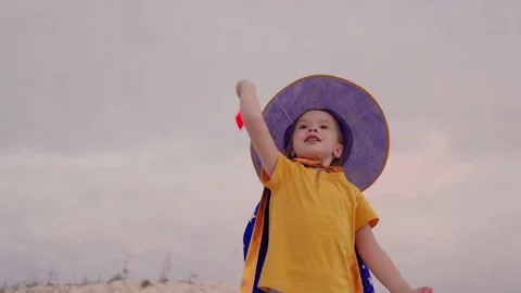 Child playing magician. Child fantasizes... | Stock Video | Pond5