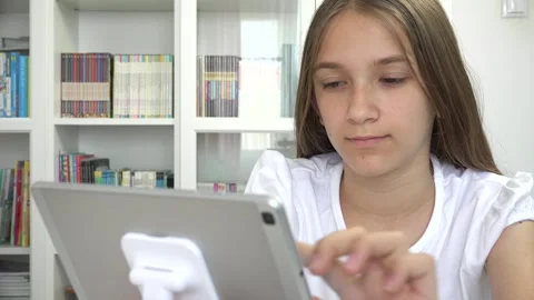 Child Playing Tablet Browsing Internet, ... | Stock Video | Pond5