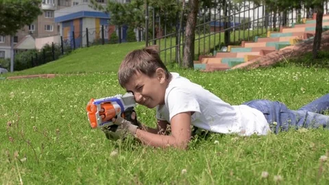 The child is playing in the war. Game on... | Stock Video | Pond5