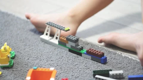 Child plays with constructor. Little boy... | Stock Video | Pond5