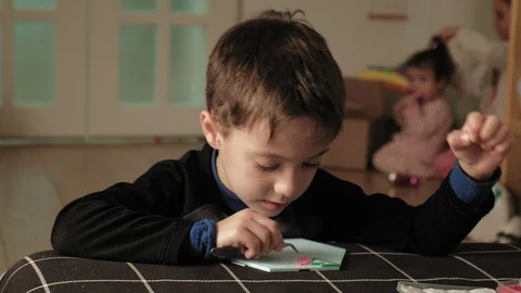 child plays with perler beads. fine moto... | Stock Video | Pond5