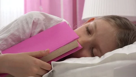 Child Sleeping after Reading Book, Littl... | Stock Video | Pond5