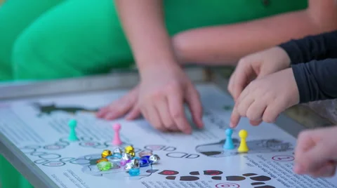 Child throwing the cube to start the tab... | Stock Video | Pond5