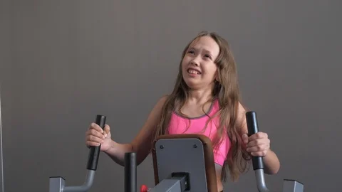 the child is training with a trainer, th... | Stock Video | Pond5